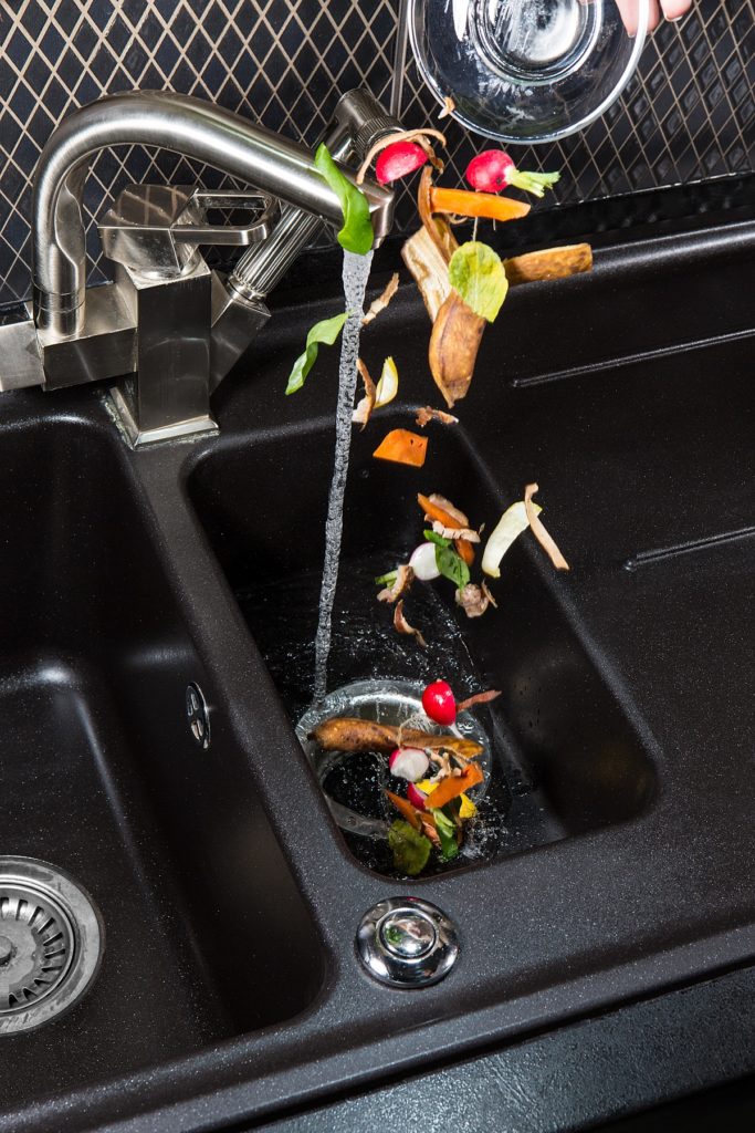 Kitchen Sink Plumbing 101: Cleaning Your Garbage Disposal - Christiansonco